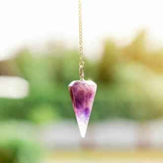 Your Beginner's Guide to Using Your Chakra Pendulum | Astrology Answers